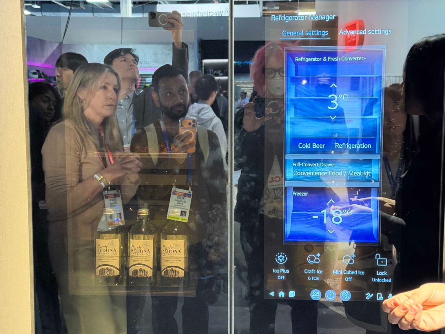 LG Is just showing off now with a transparent OLED on its fridge
